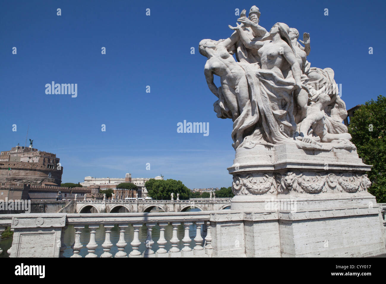Statue on the Ponte Vittorio Emanuele II with Castel Sant Angelo in the ...