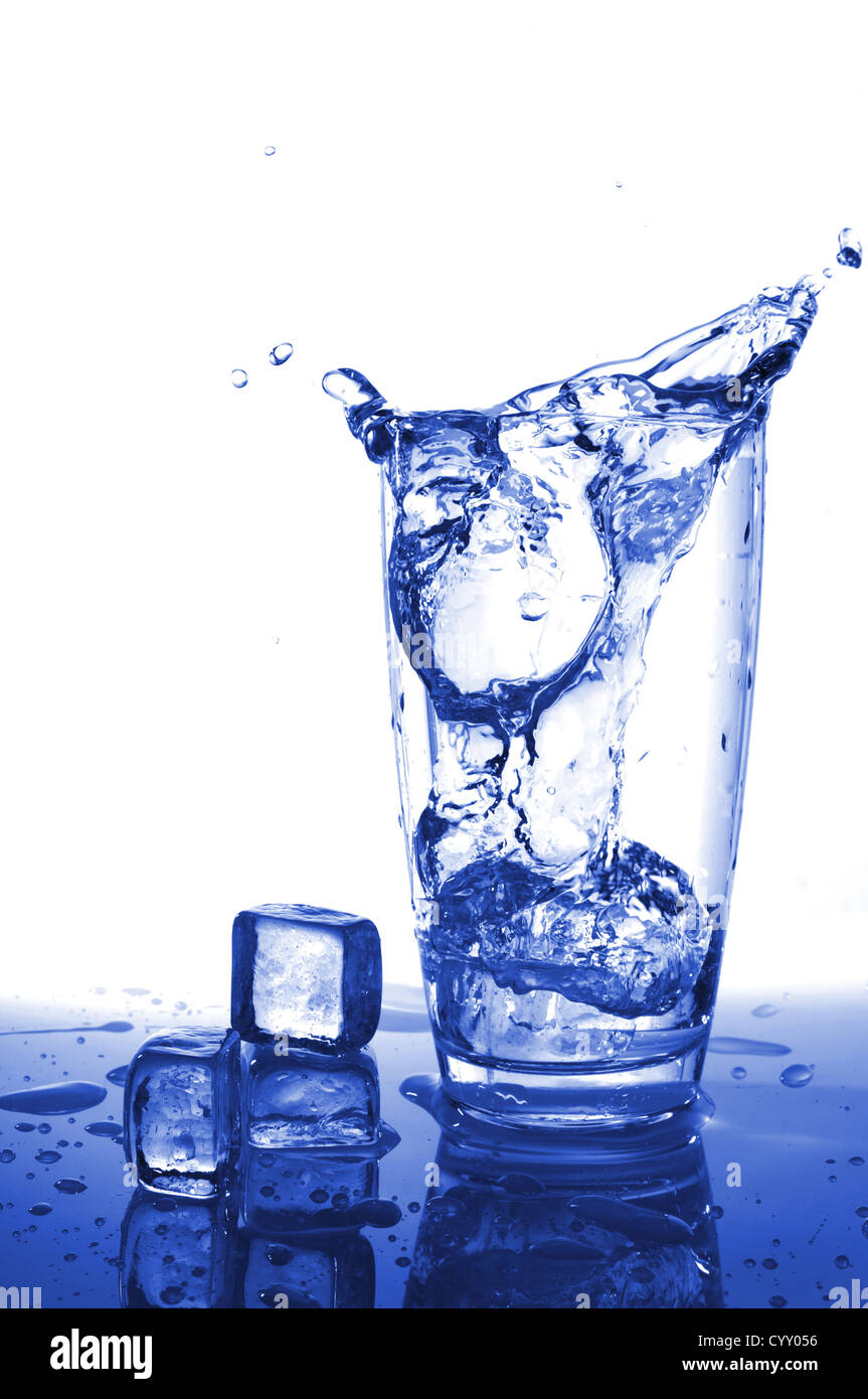 ice water pouring in transparent glass or cup Stock Photo - Alamy
