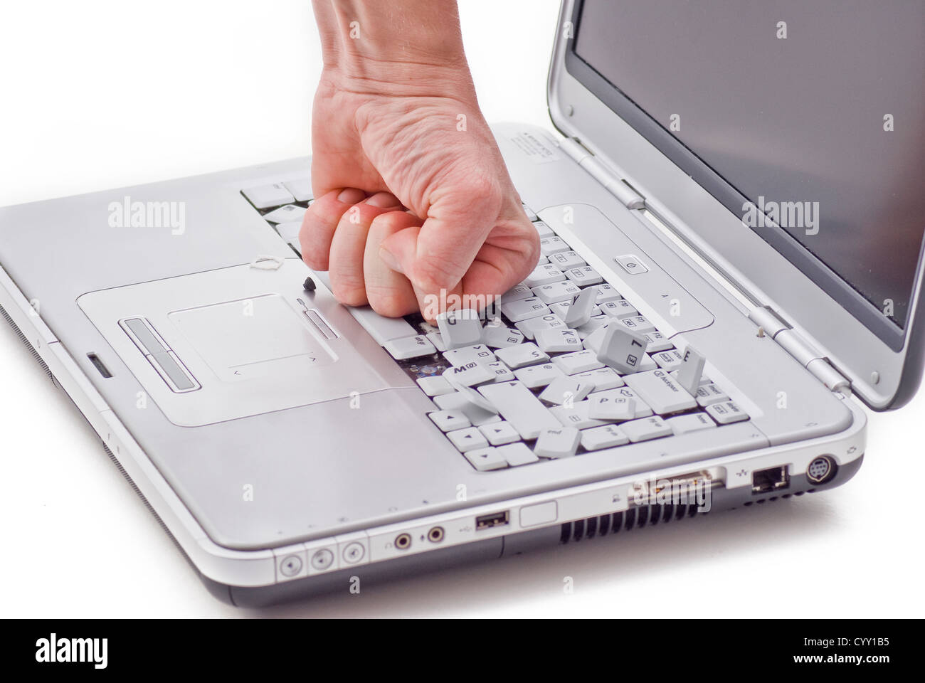 By hand damaged laptop keyboard on white background Stock Photo - Alamy