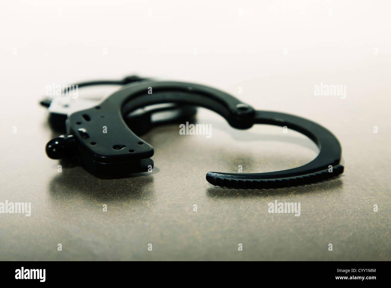 Open handcuffs hi-res stock photography and images - Alamy