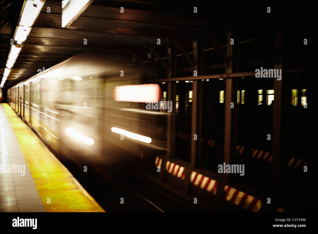 USA, New York, Train passing through subway station Stock Photo - Alamy