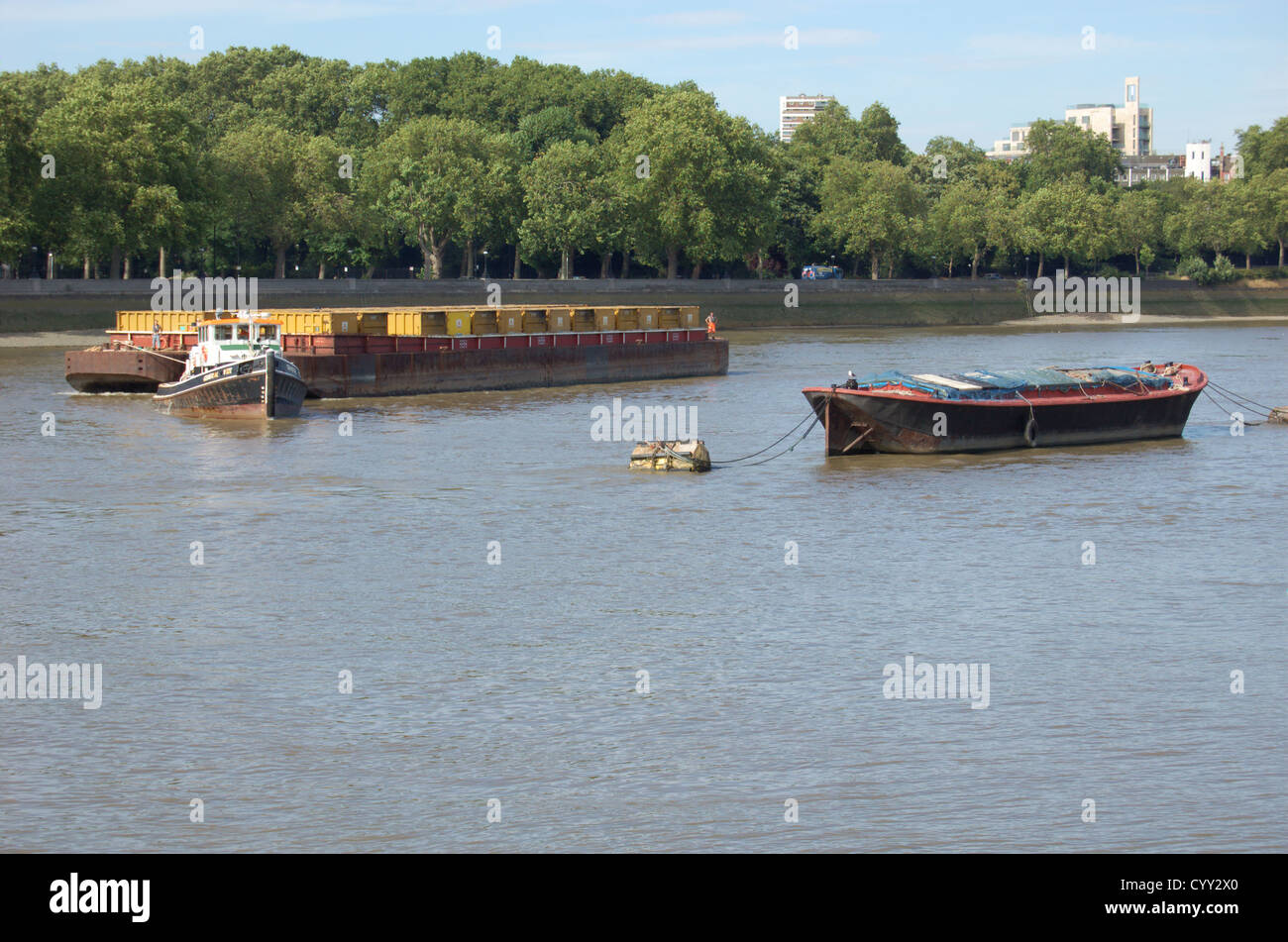 Barges on the River Thames at Battersea in London, England Stock Photo ...
