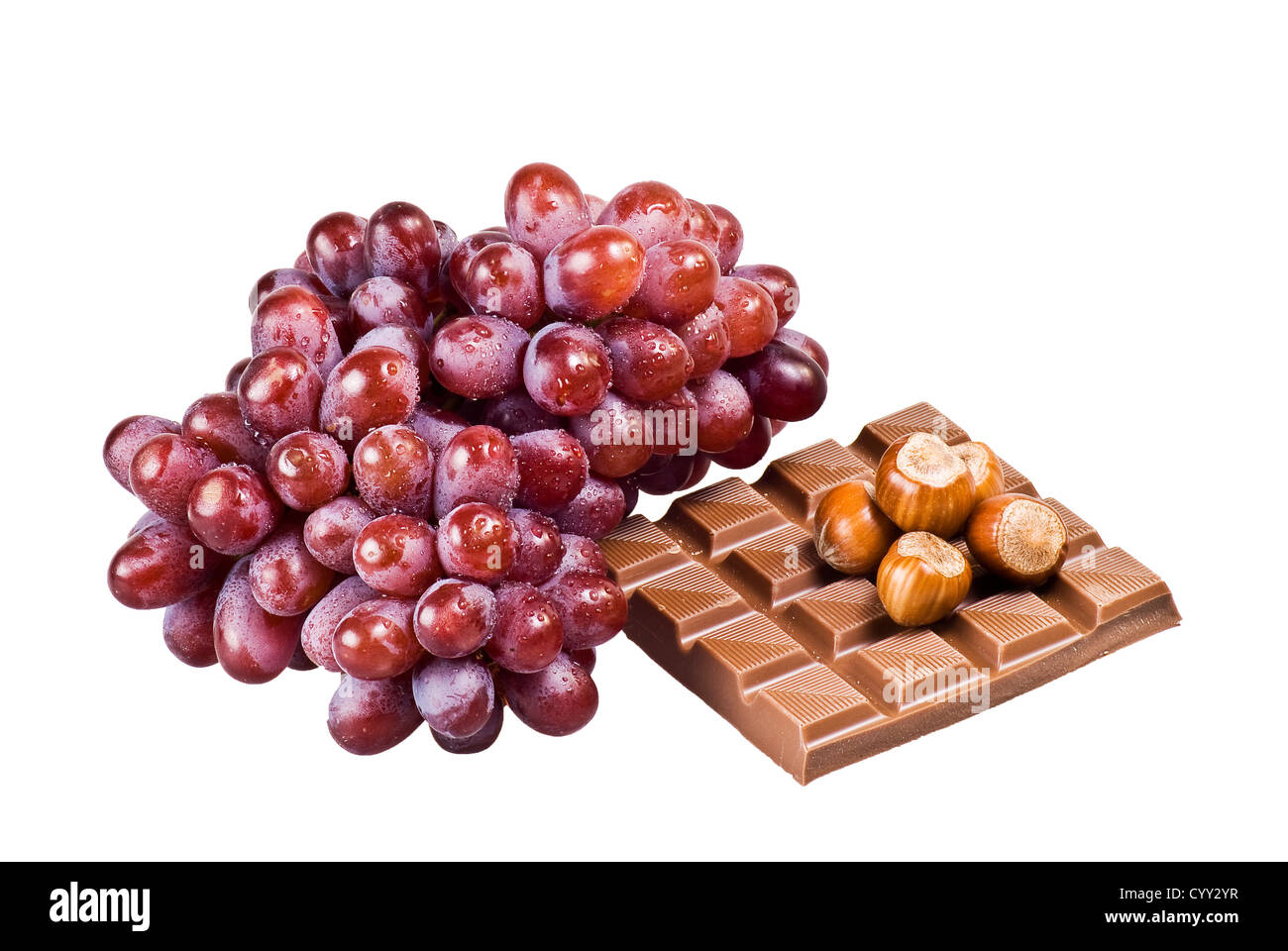 Red grapes with chocolate and nuts in shells on white background Stock ...