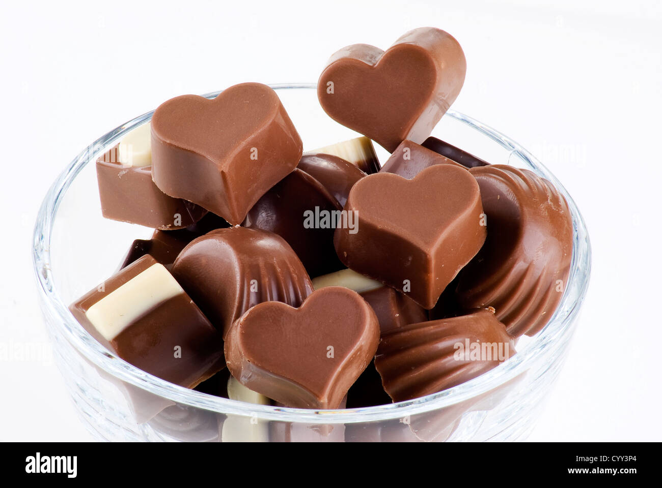 Glass bowl of assorted chocolates - close up Stock Photo - Alamy