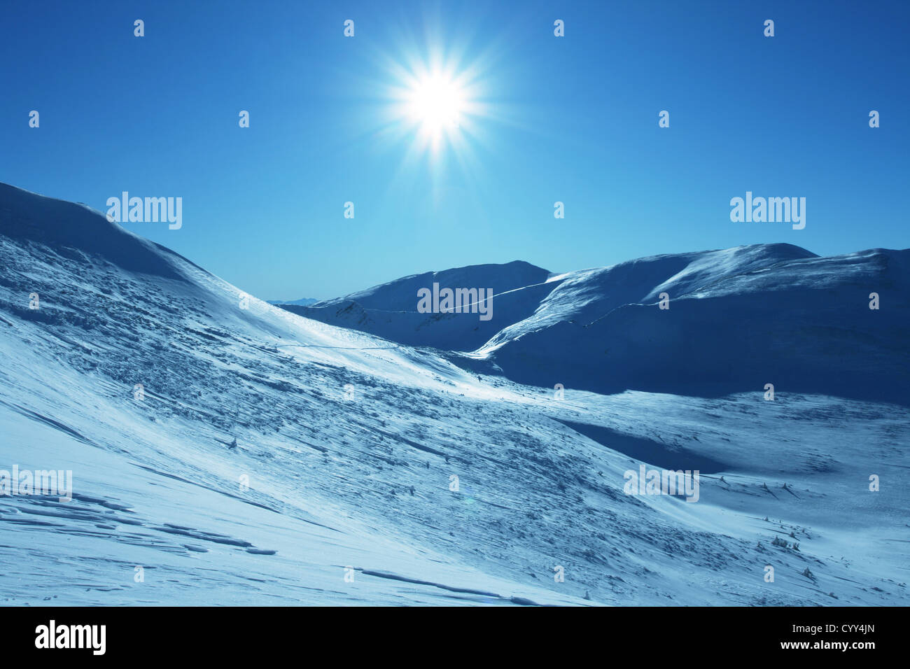 Sun and snow Stock Photo - Alamy