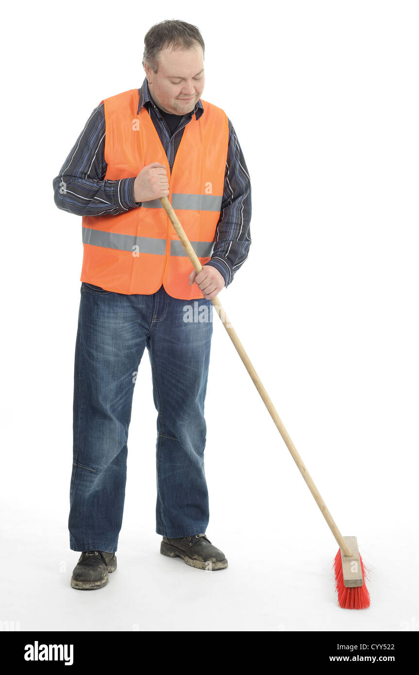 Worker cleaning sweeping with sweep besom Stock Photo - Alamy