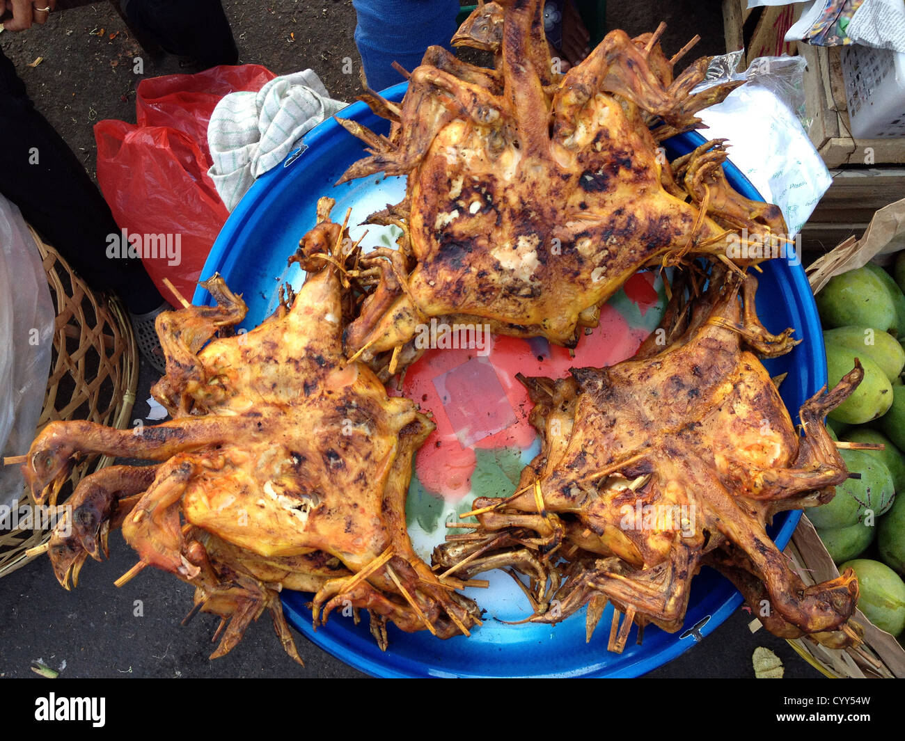 Grilled chickens in open air food market in Pasar Kumbasari Denpasar ...