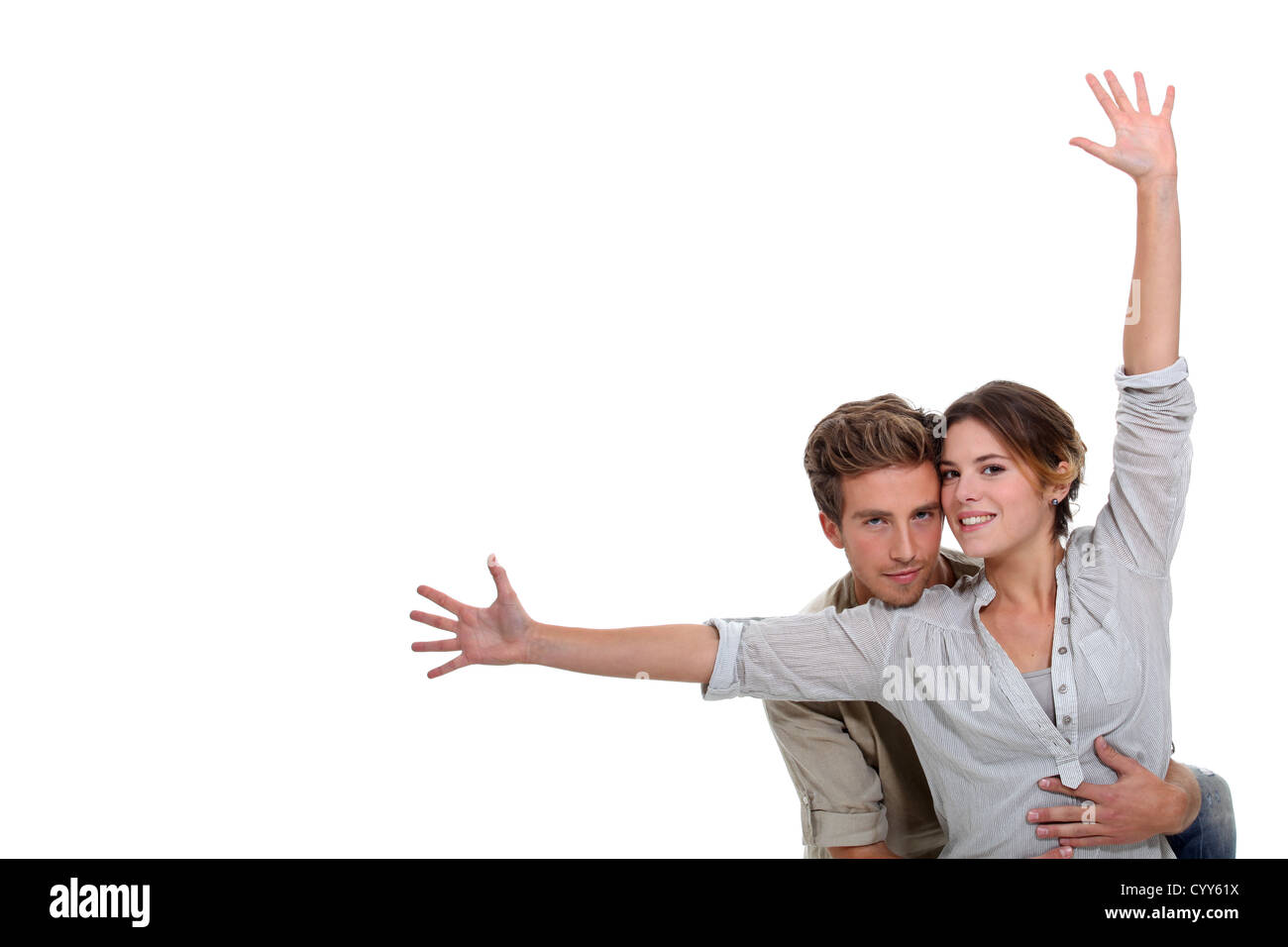 girl with open arms and boyfriend embracing her Stock Photo - Alamy