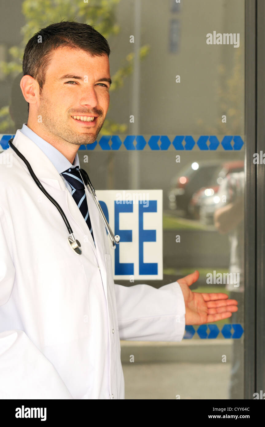 portrait of doctor in front an entrance of the hospital Stock Photo - Alamy