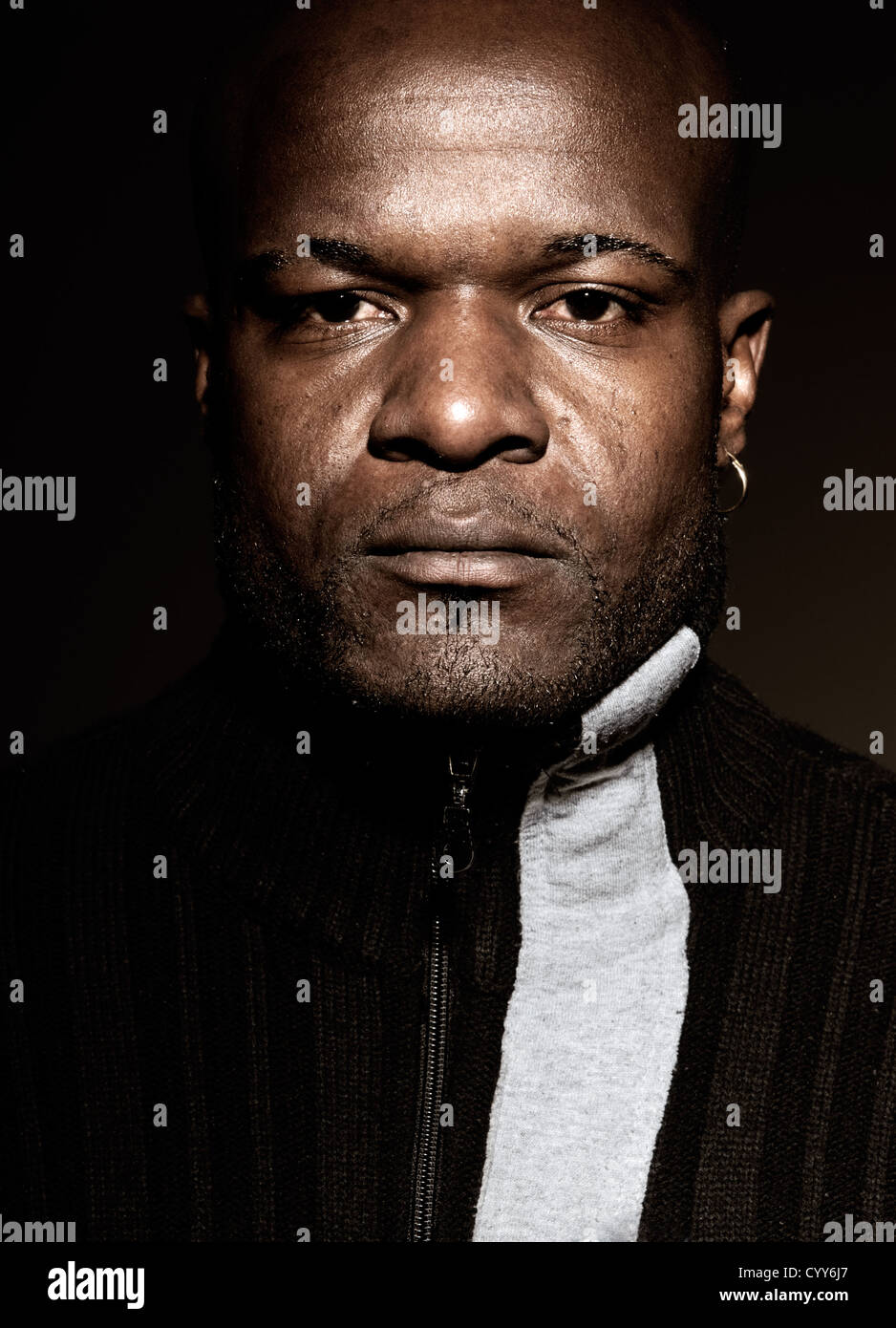 Black "gangster men" looking serious high conrast low key Stock Photo ...