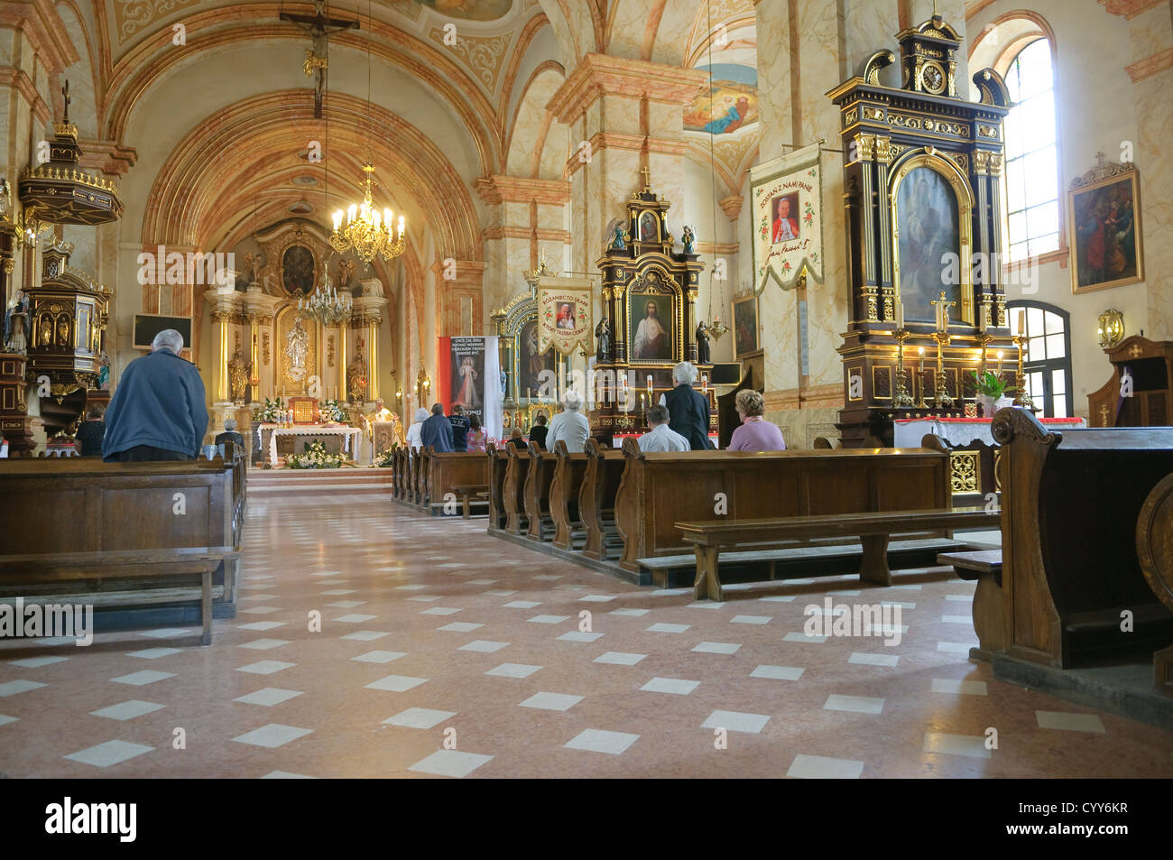 People praying in parish church, Wadowice, Poland Stock Photo - Alamy