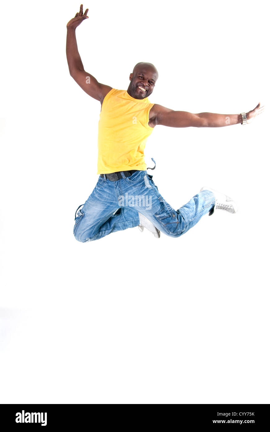Young black man jumping hi-res stock photography and images - Alamy