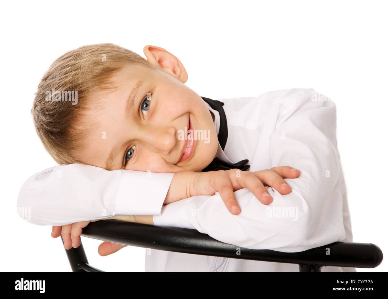Happy seven years boy staring at you isolated Stock Photo - Alamy