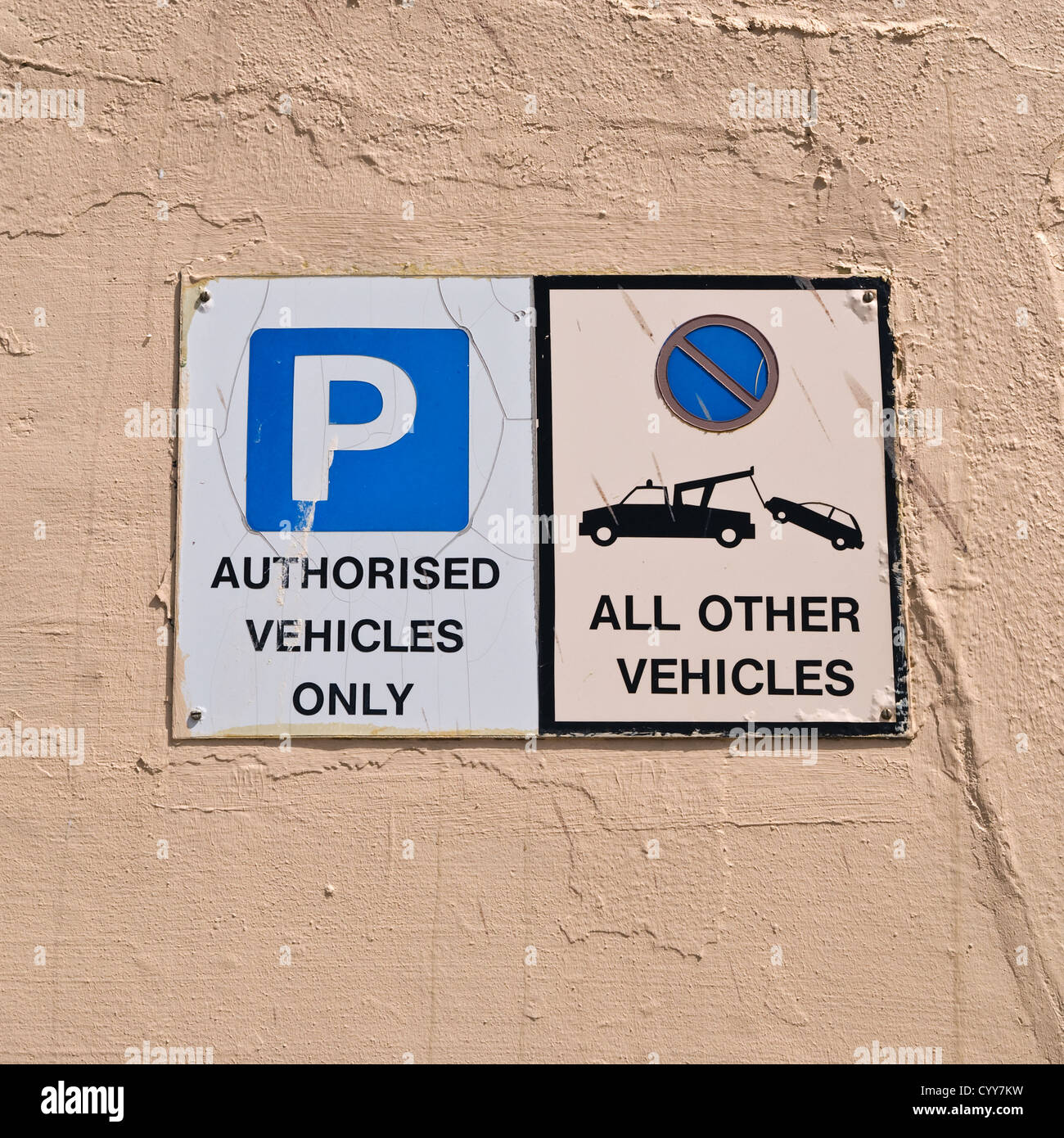 Old battered no parking sign, authorised vehicles only, all other ...