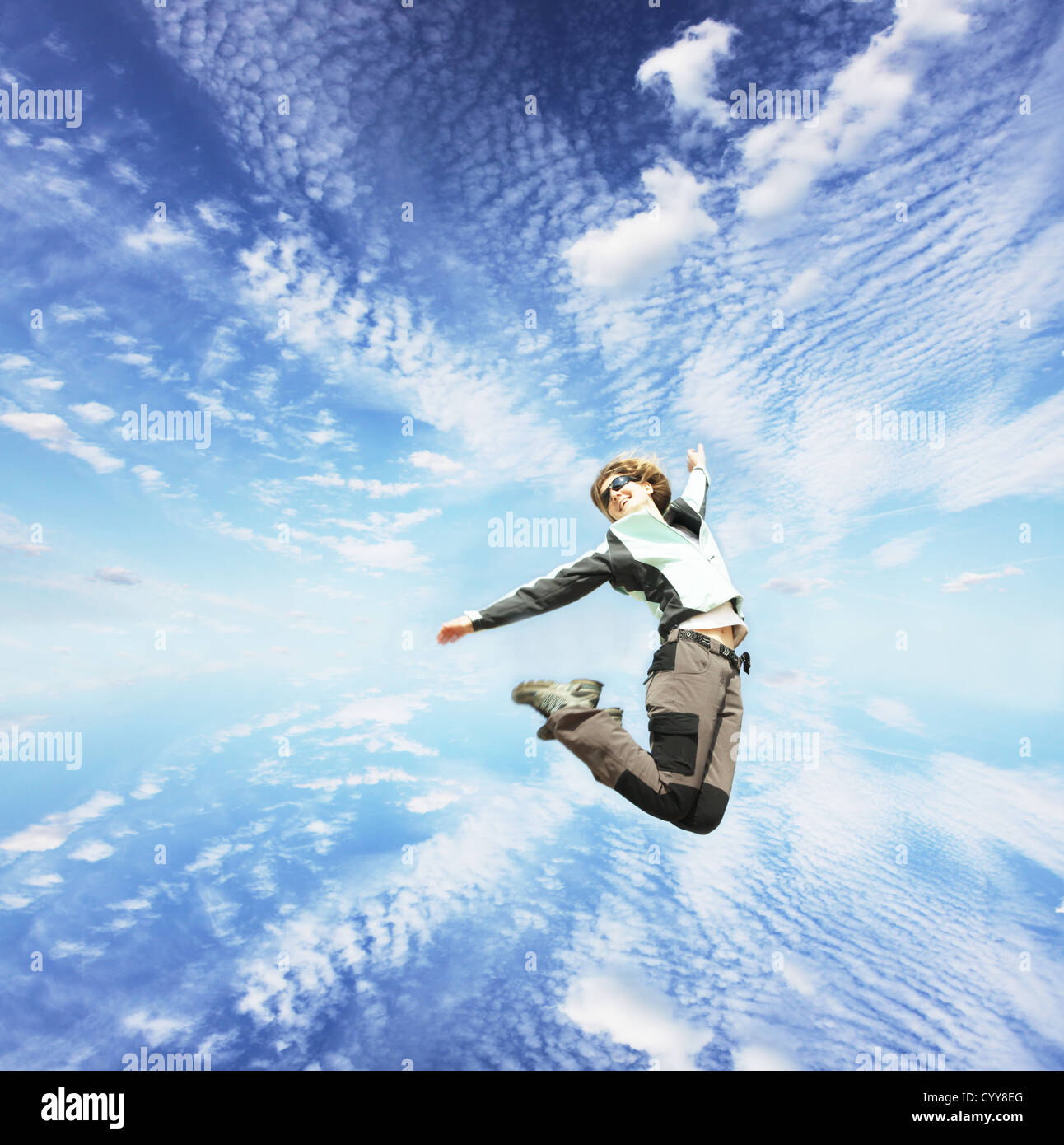 Happiness girl in jump Stock Photo - Alamy