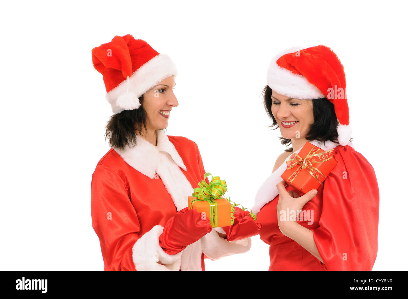 two woman santa isolated on white background Stock Photo - Alamy