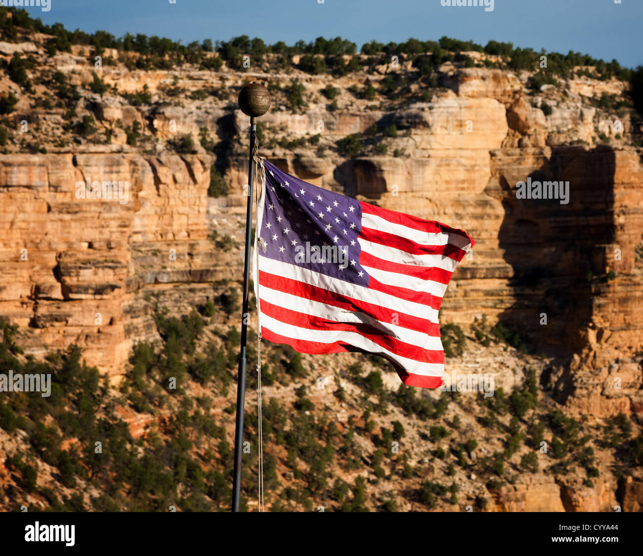 Fluttering American Flag in front of Grand Canyon Ridge Stock Photo - Alamy