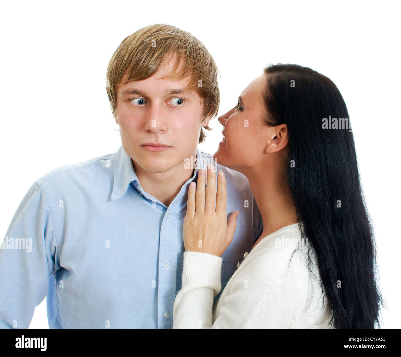 Woman whispering to a man. Isolated on white Stock Photo - Alamy