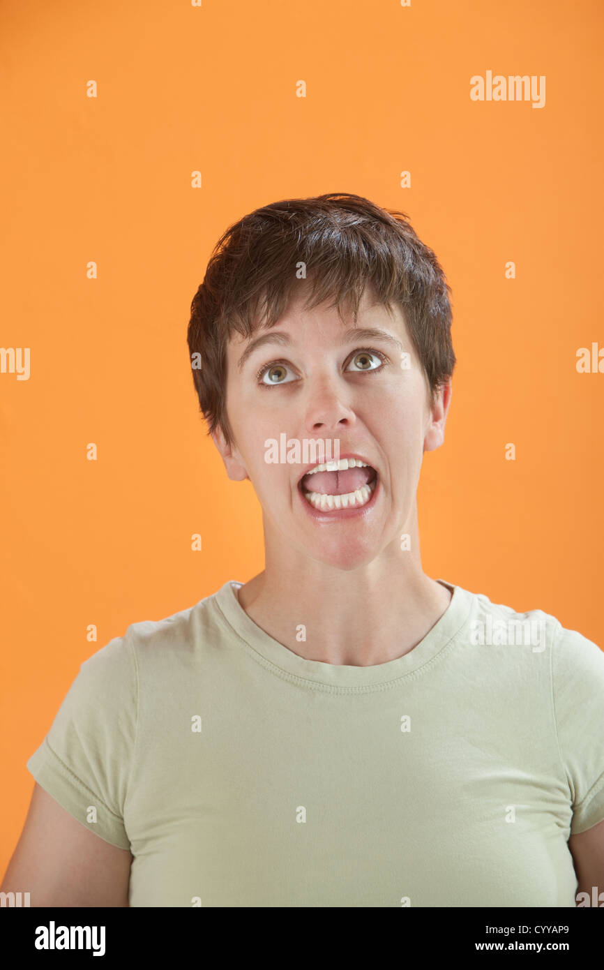 Frustrated young lady screaming on top of her voice Stock Photo - Alamy