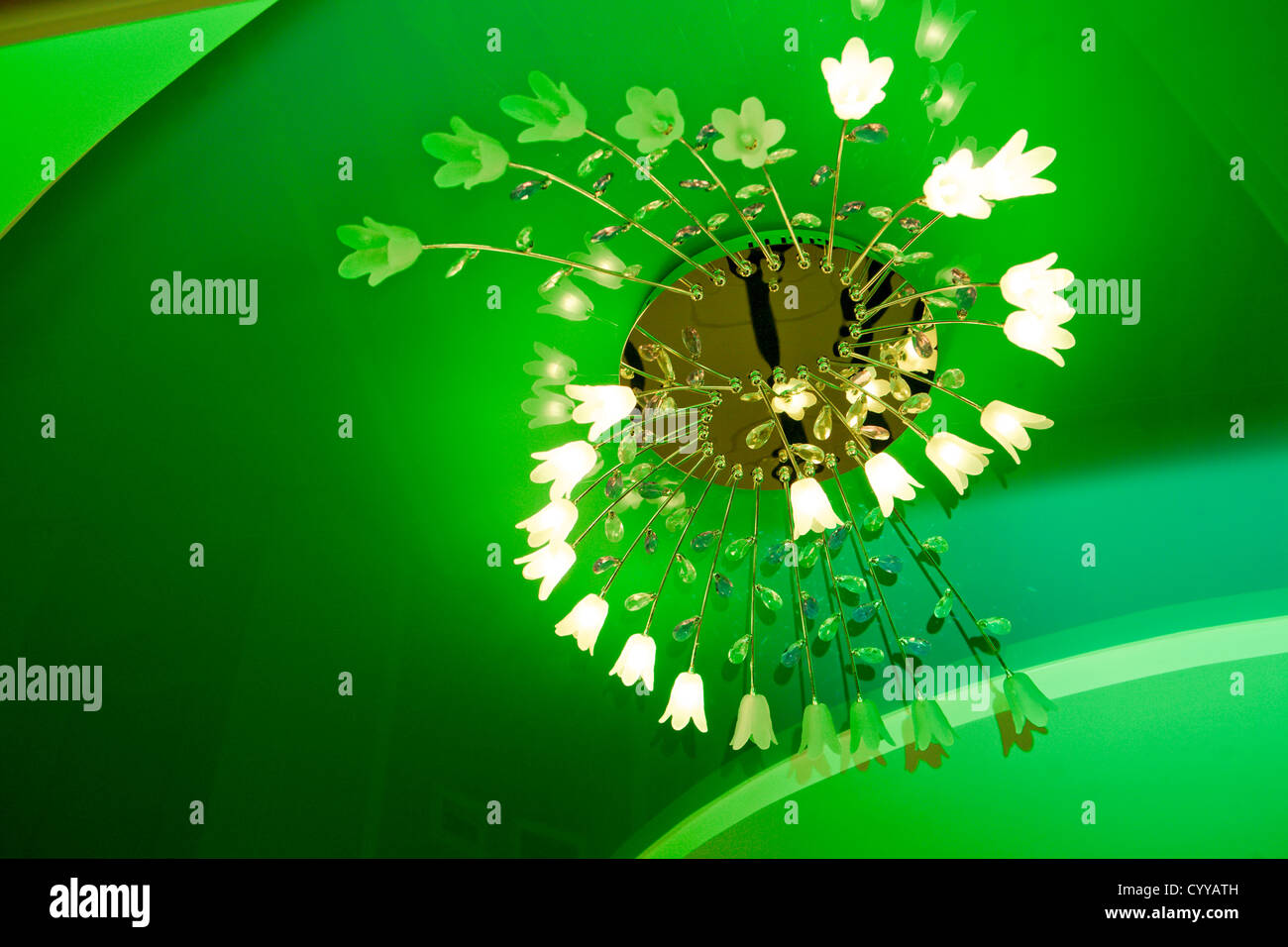 Modern Lamp and mirror reflection of it in ceiling Stock Photo - Alamy