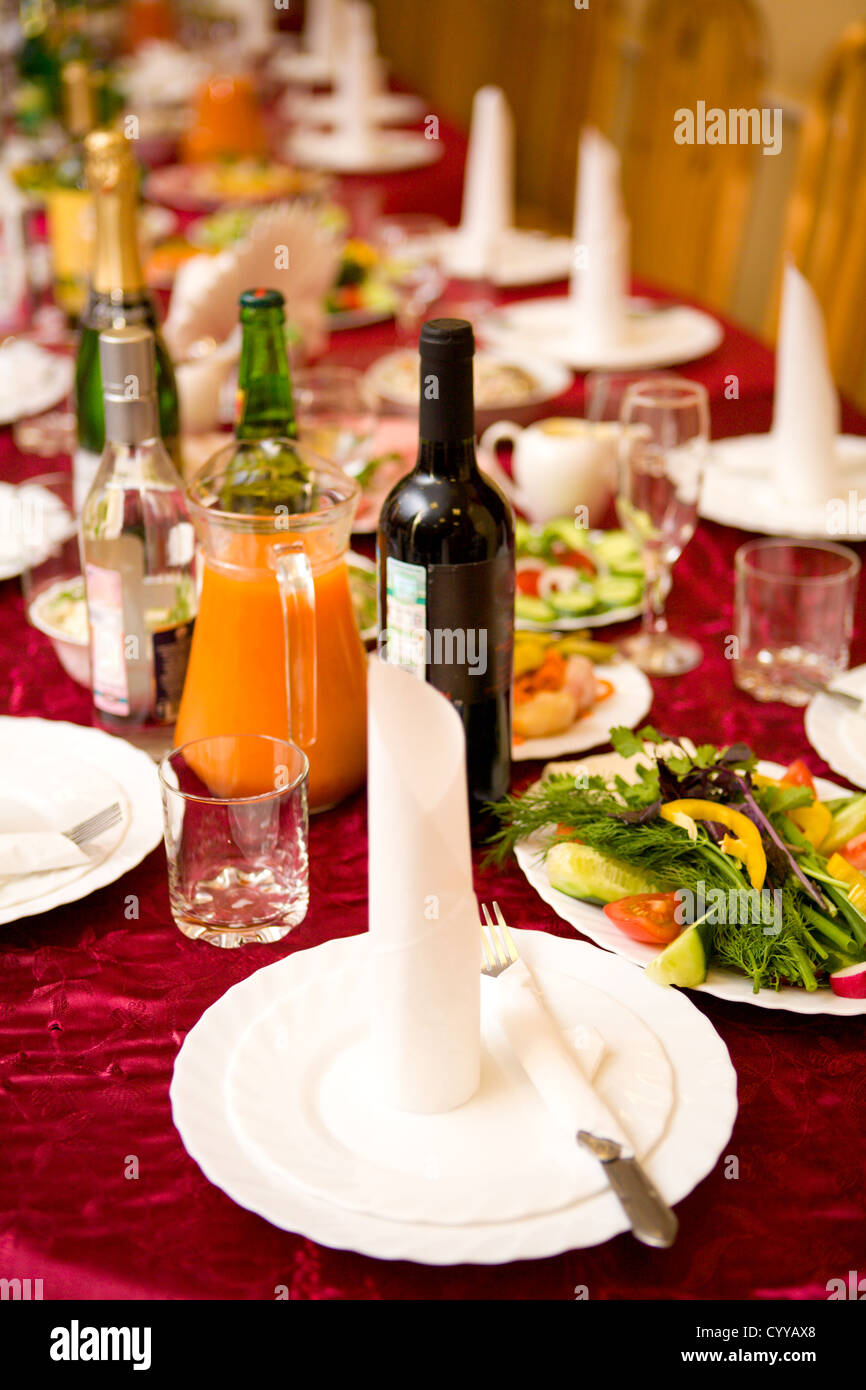 Restaurant table with snacks and beverages on it Stock Photo - Alamy