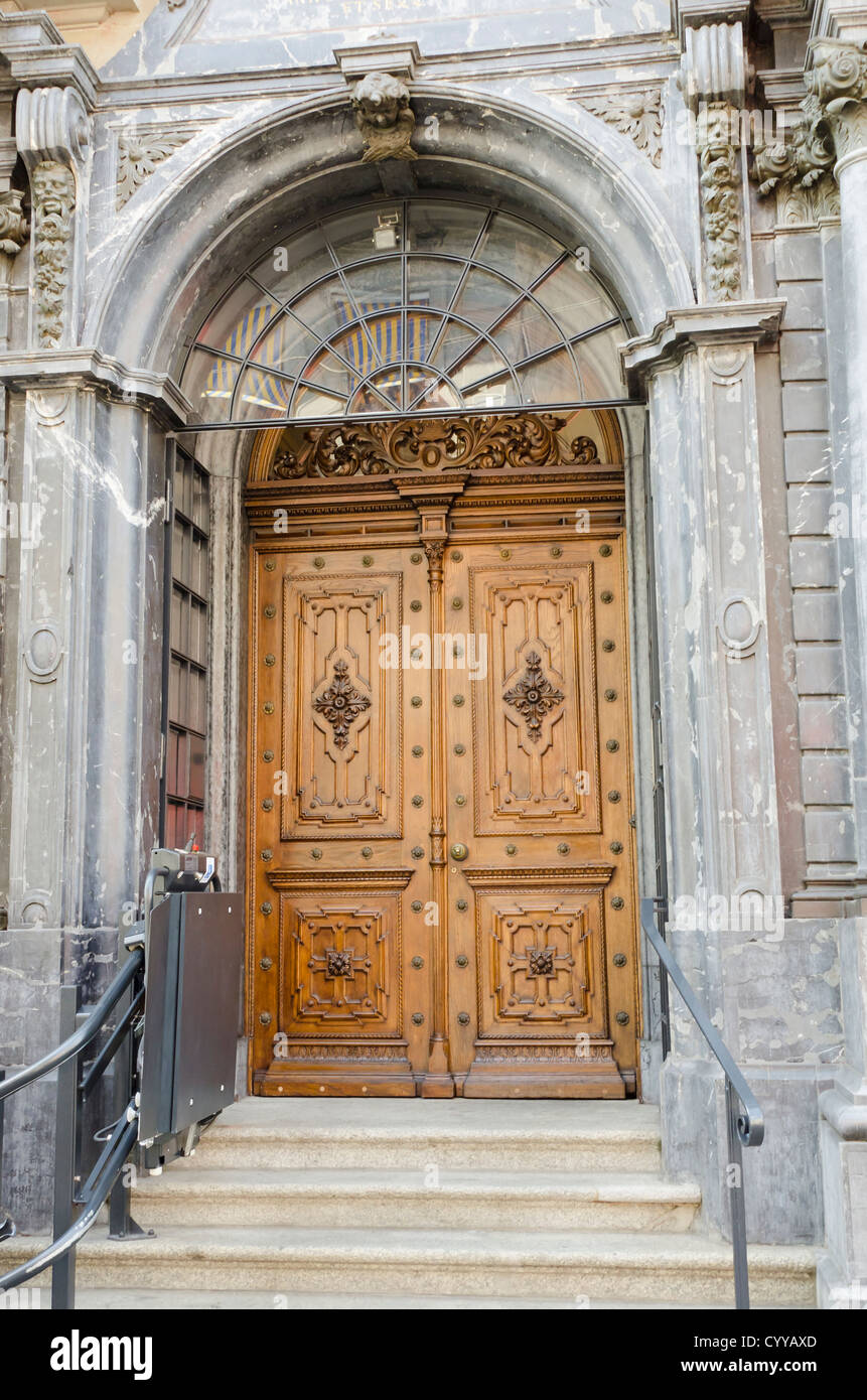 Grand entrance wood doors Stock Photo - Alamy