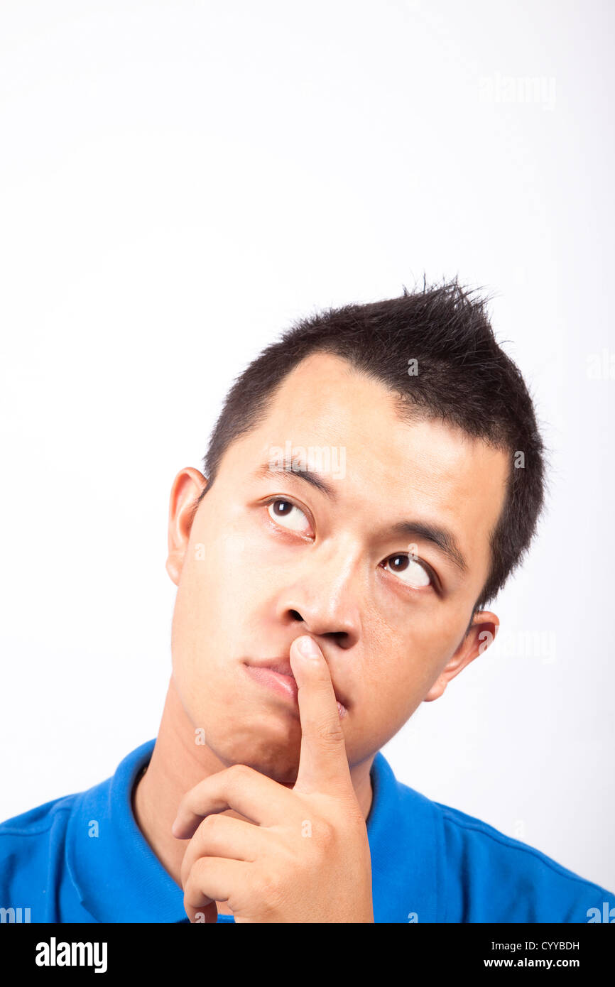 Young man thinking - portrait isolated on white Stock Photo - Alamy