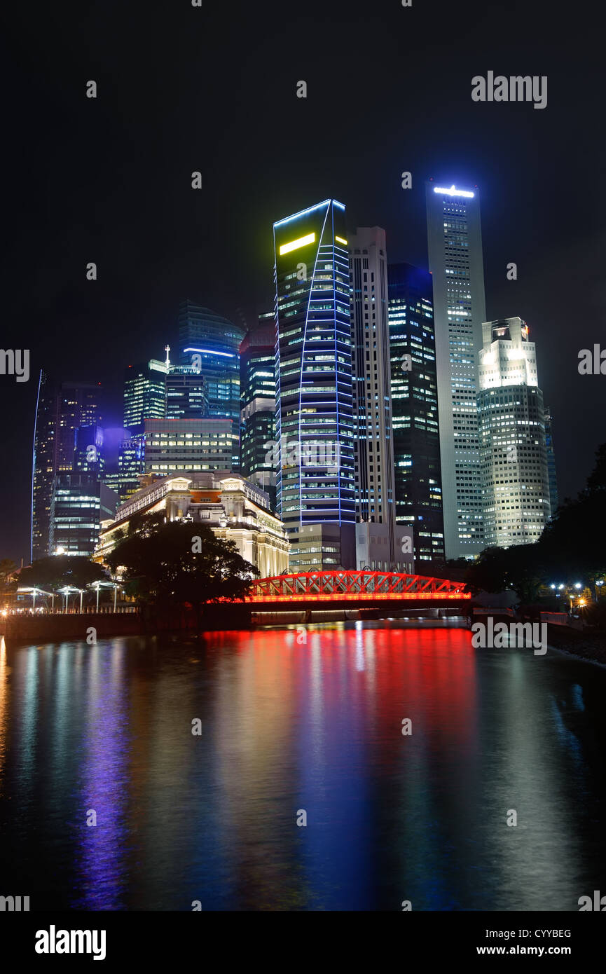 Colorful city night with skyscrapers near river in Singapore, Asia ...