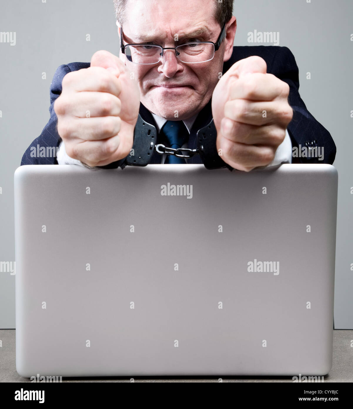 Restrained in handcuffs hi-res stock photography and images - Alamy