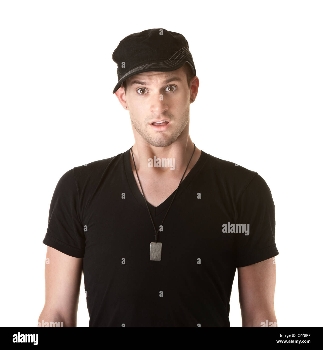 Shocked young Caucasian man with raised eyebrows over white background ...