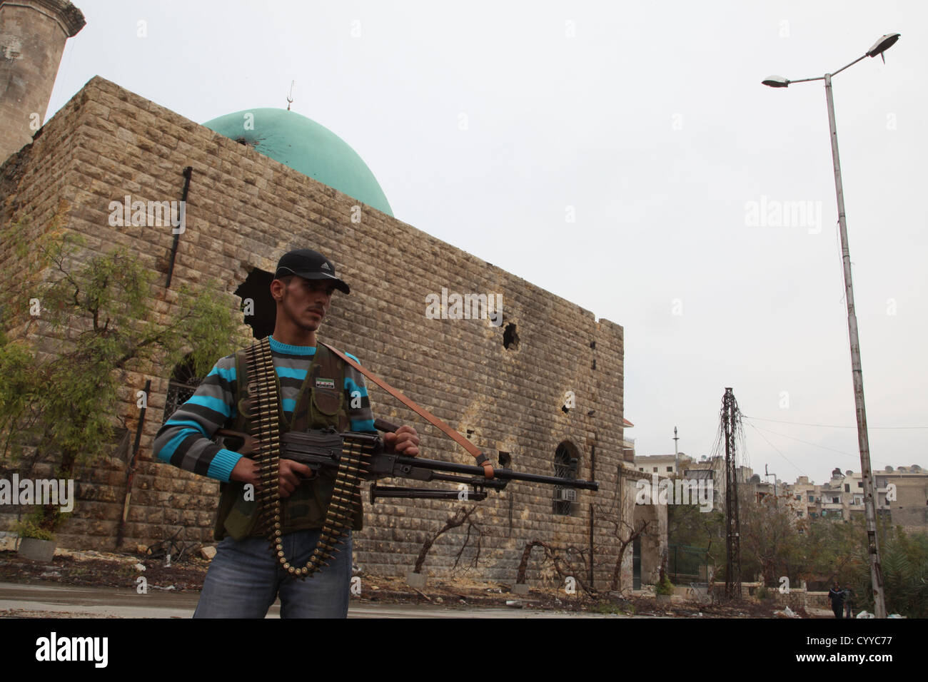 Nov. 08, 2012 - Aleppo, Syria - Rebel hold a .50 caliber machine gun ...