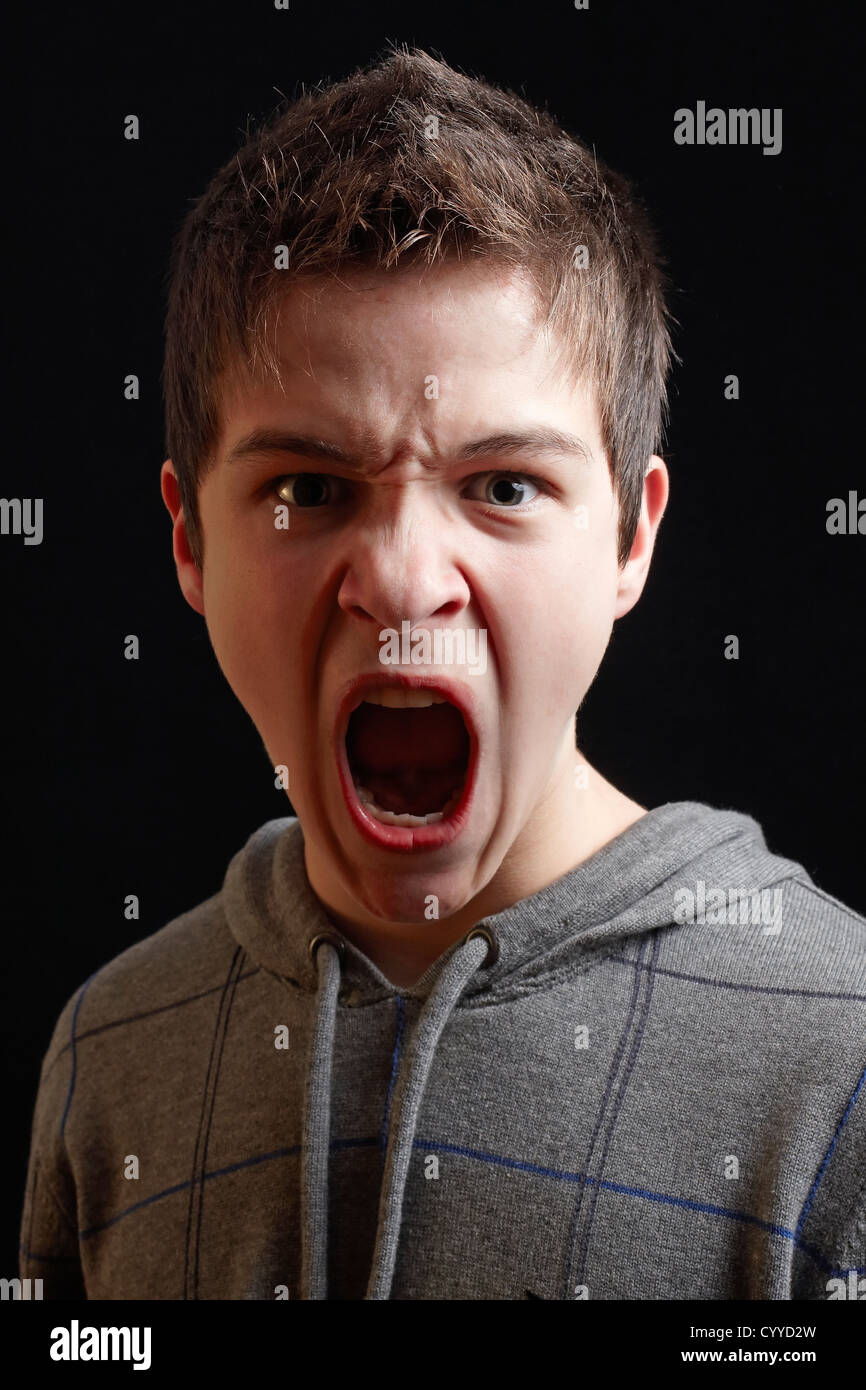 Young man shouting out his boldness and decision Stock Photo - Alamy