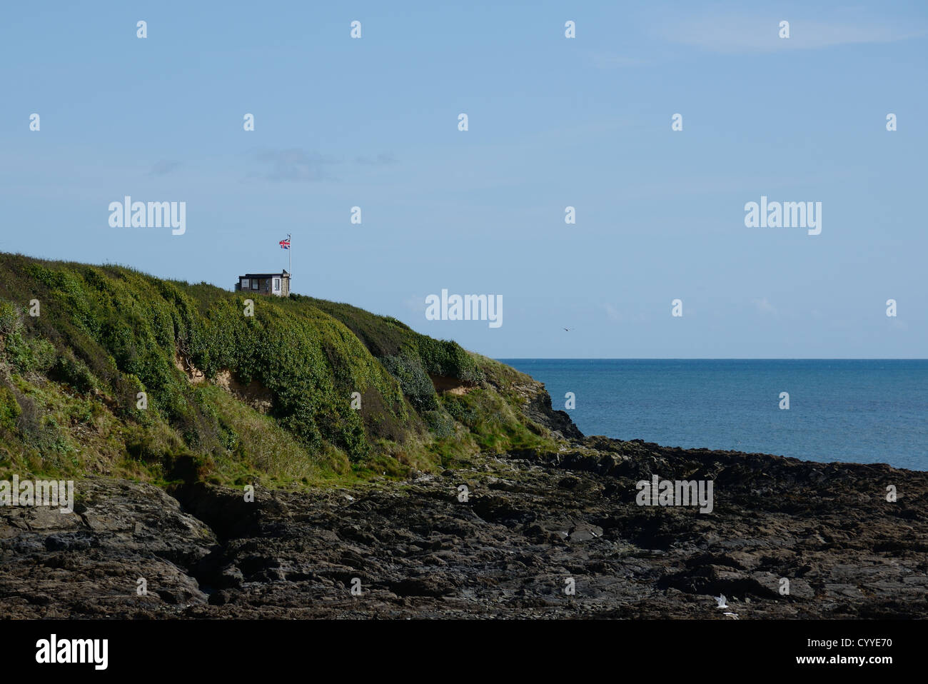 Section of the Cornish coastal path with the Coastwatch hut Stock Photo ...