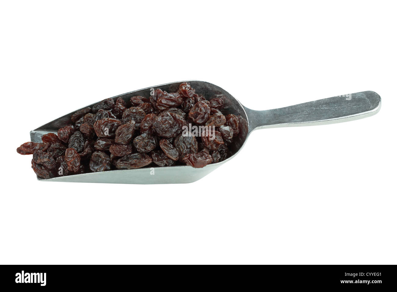 Scoop of raisins isolated on a white background with clipping path ...