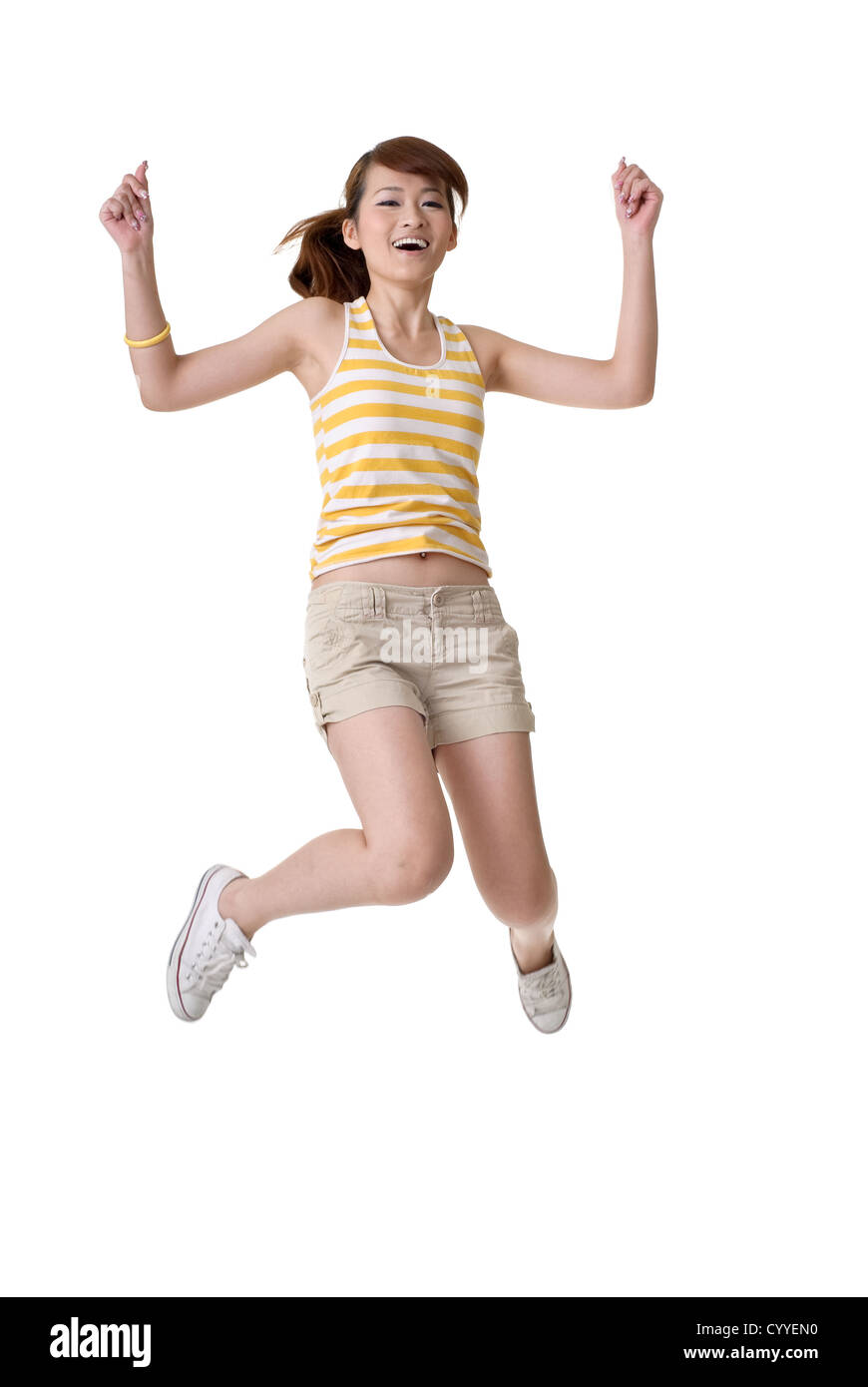 Happy girl jump, full length portrait isolated on white background ...