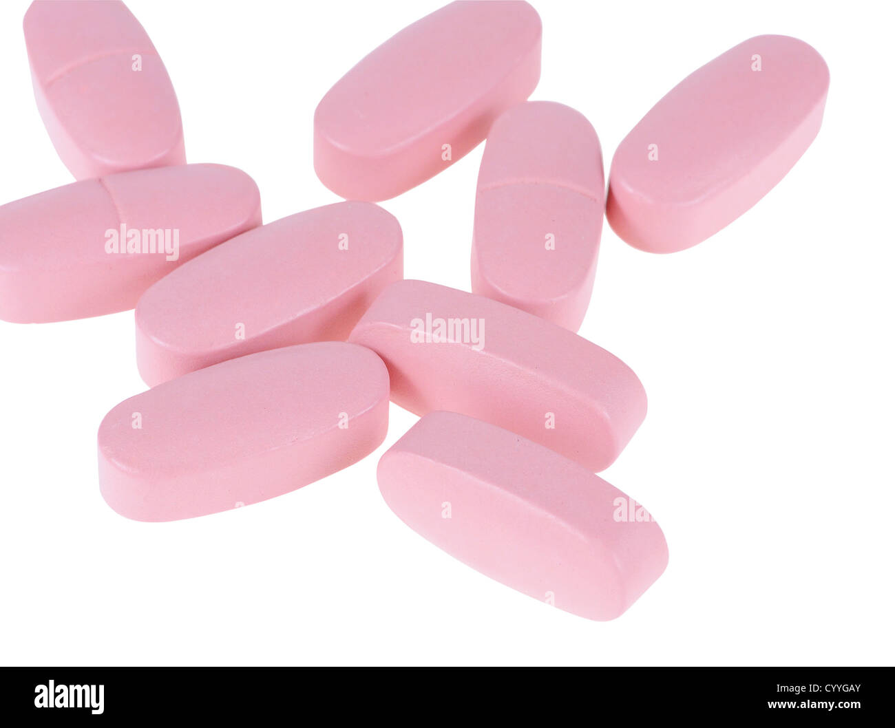 The pink tablets isolated on white background Stock Photo - Alamy