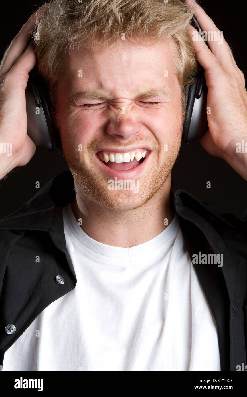 Black teenager headphones eyes closed hi-res stock photography and images - Alamy