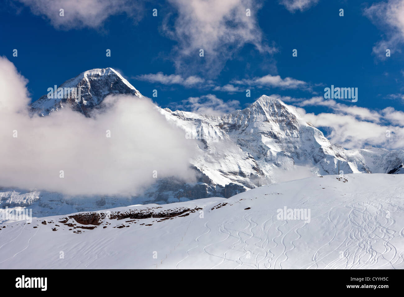 Ski slope in the background of Mount Eiger. The Eiger is a mountain in ...