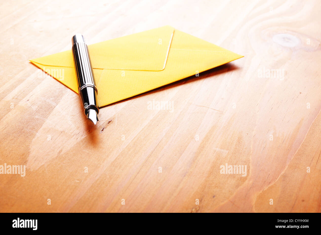mail or email concept with envelope and pen Stock Photo - Alamy