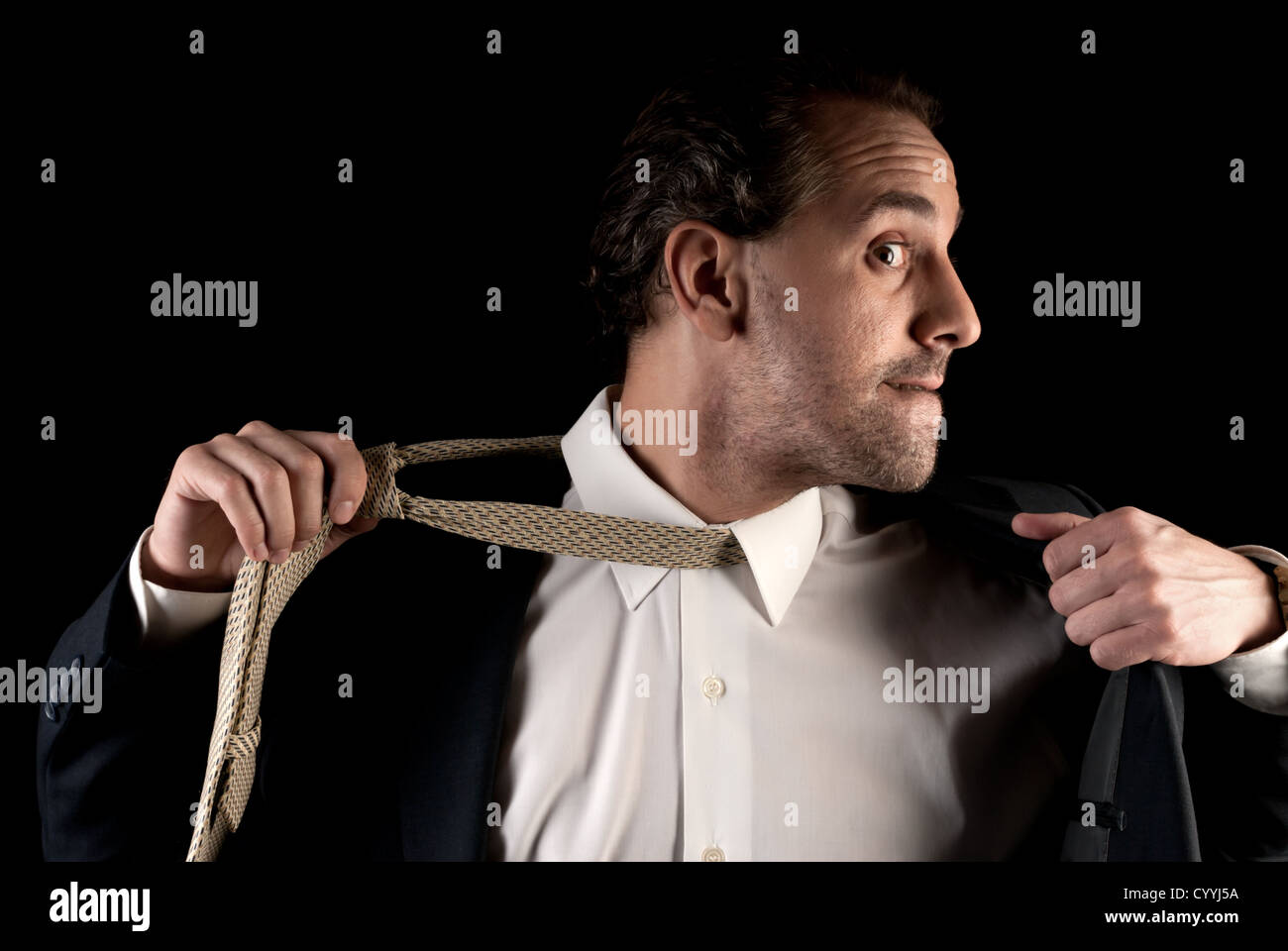 Pulling on tie hi-res stock photography and images - Alamy