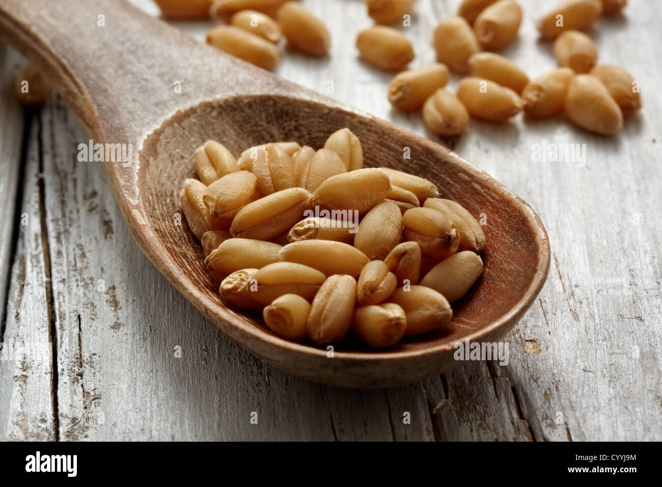 sweet corn on a wood spoon Stock Photo - Alamy