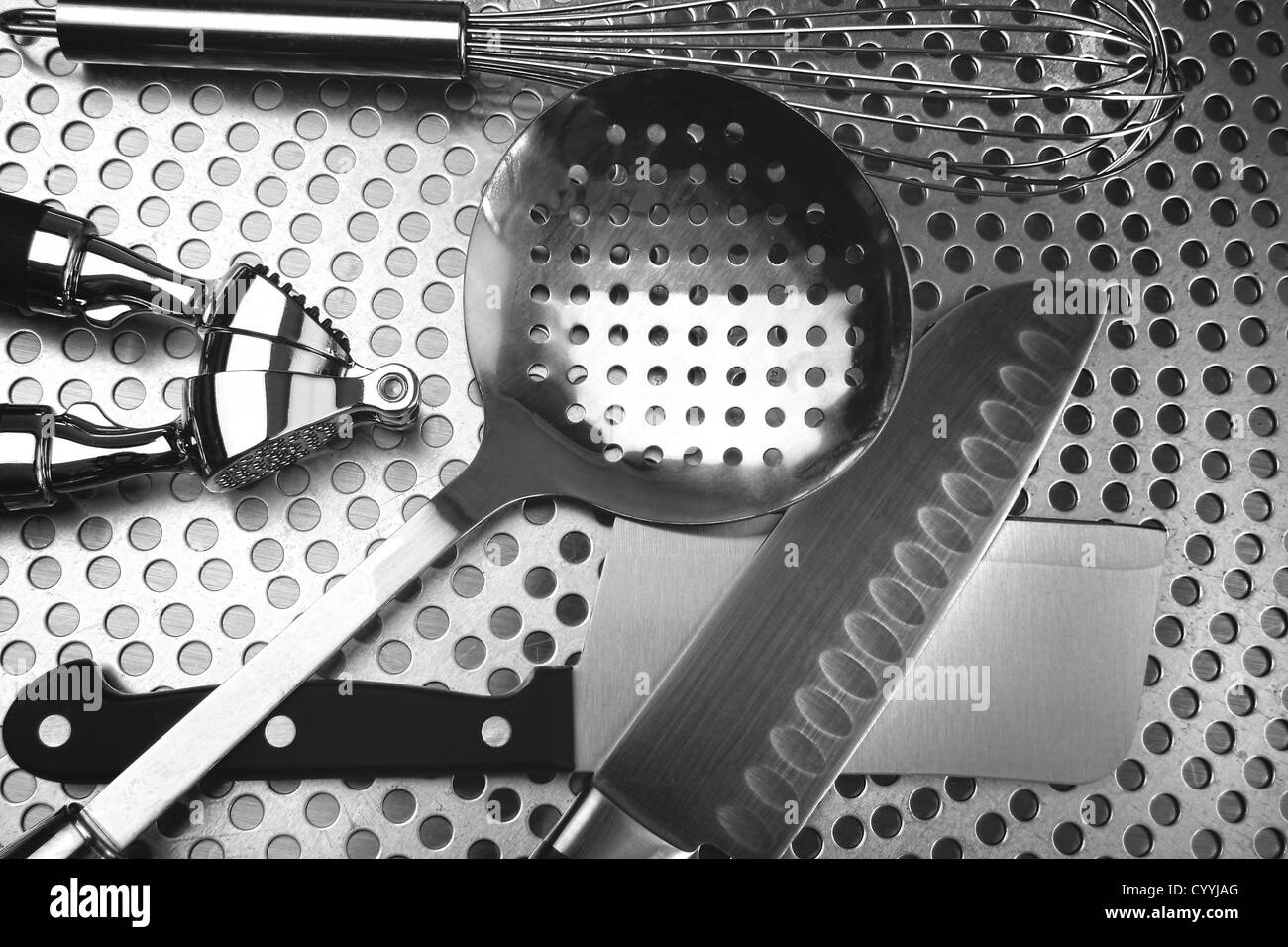 Overhead shot of kitchen utensils on stainless steel Stock Photo - Alamy