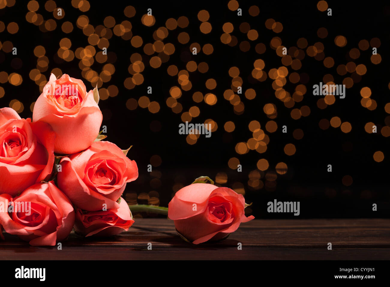 Romantic roses on table Stock Photo - Alamy