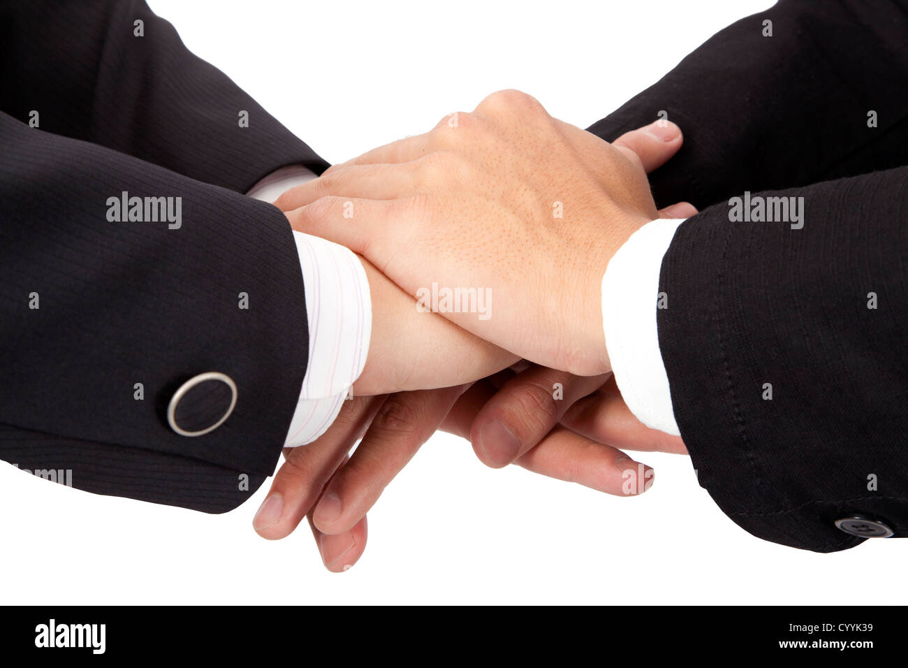 Trust and cooperation concept. stacked hands of businessman Stock Photo ...