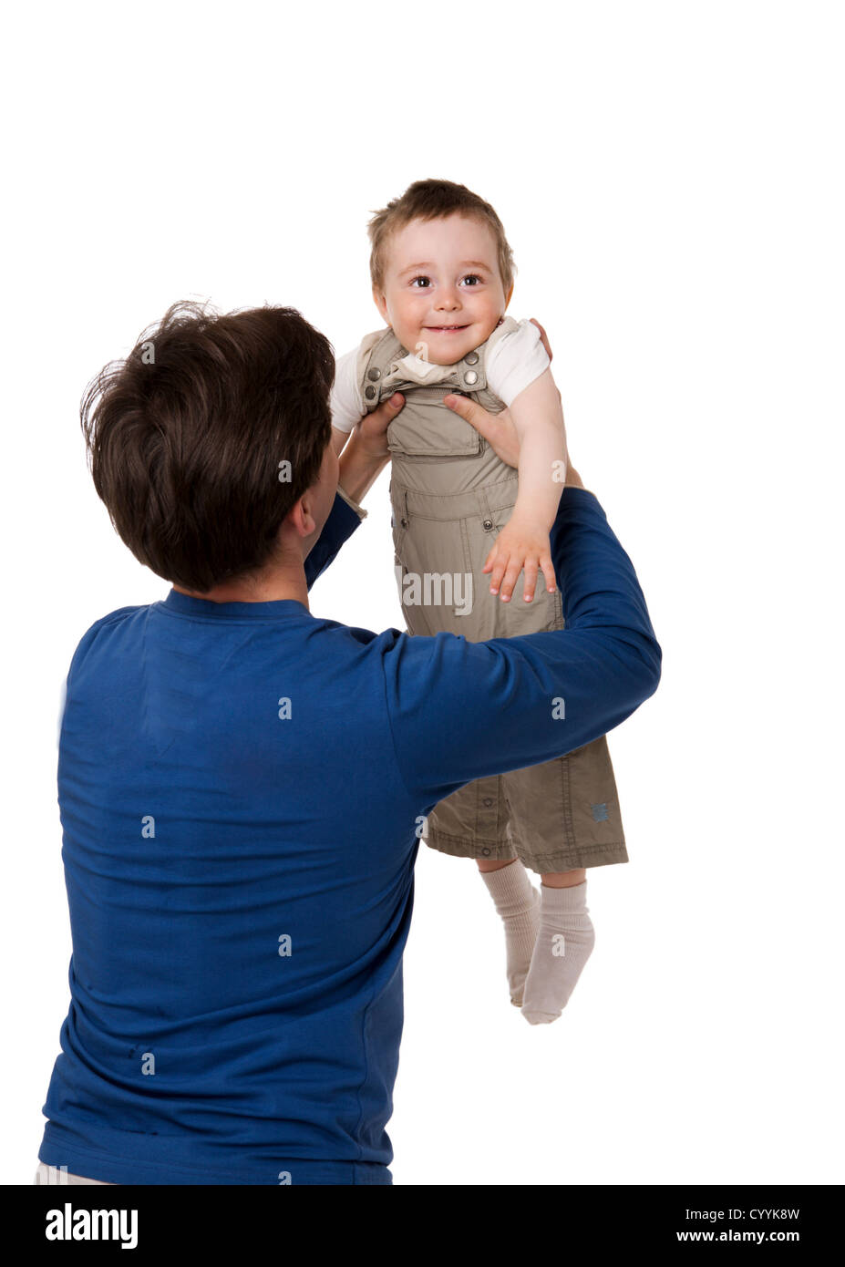 Happy father holding one years son back view isolated Stock Photo - Alamy