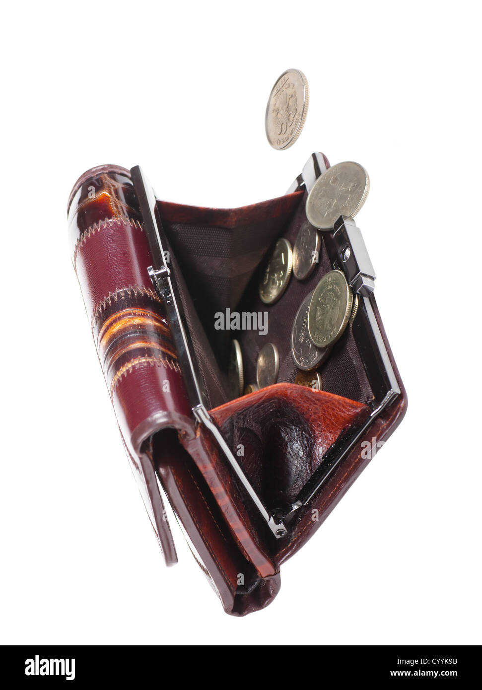 Coins falling into a female purse isolated over white background Stock ...