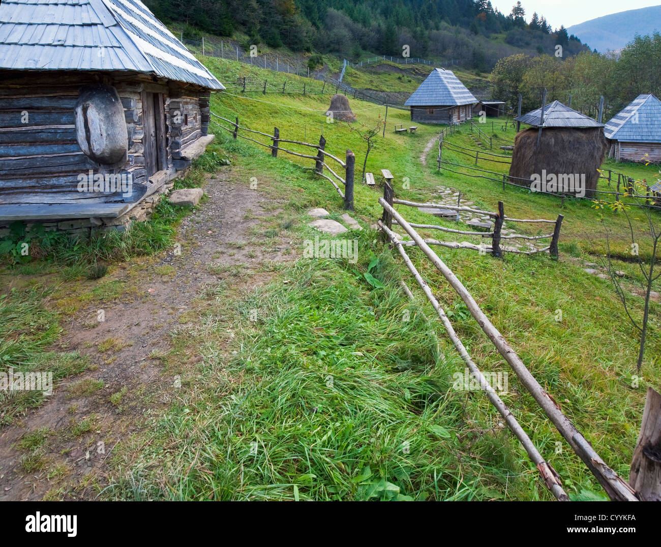 Autumn misty mountain village with wooden house (Carpathian , Ukraine ...