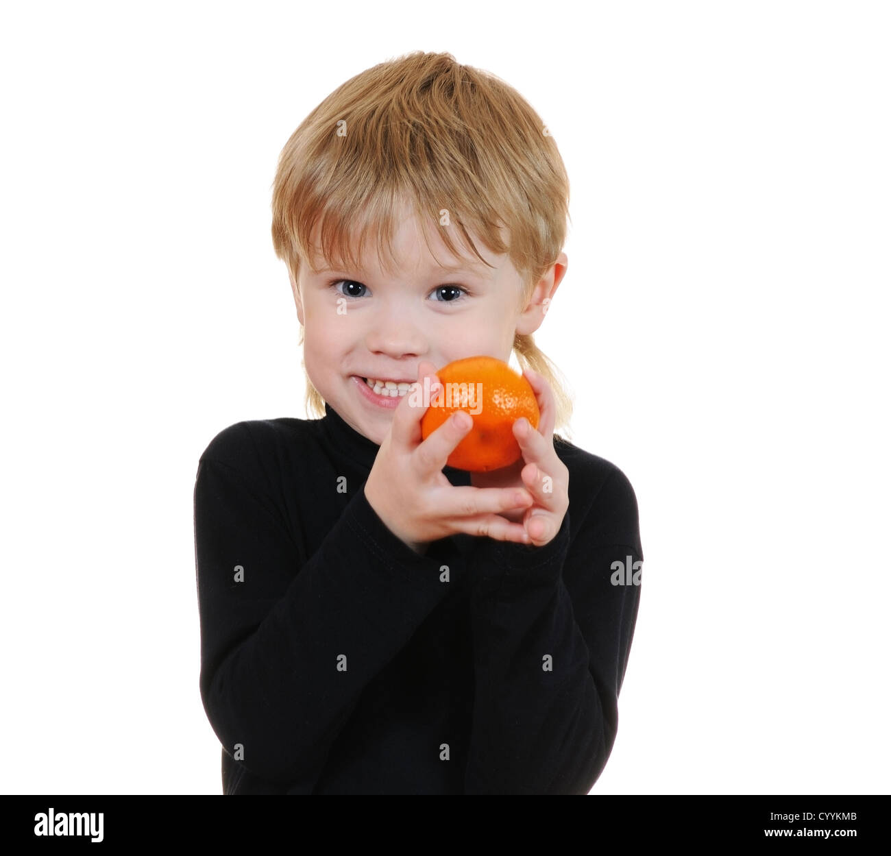 The cheerful child with orange isolated on white background Stock Photo ...
