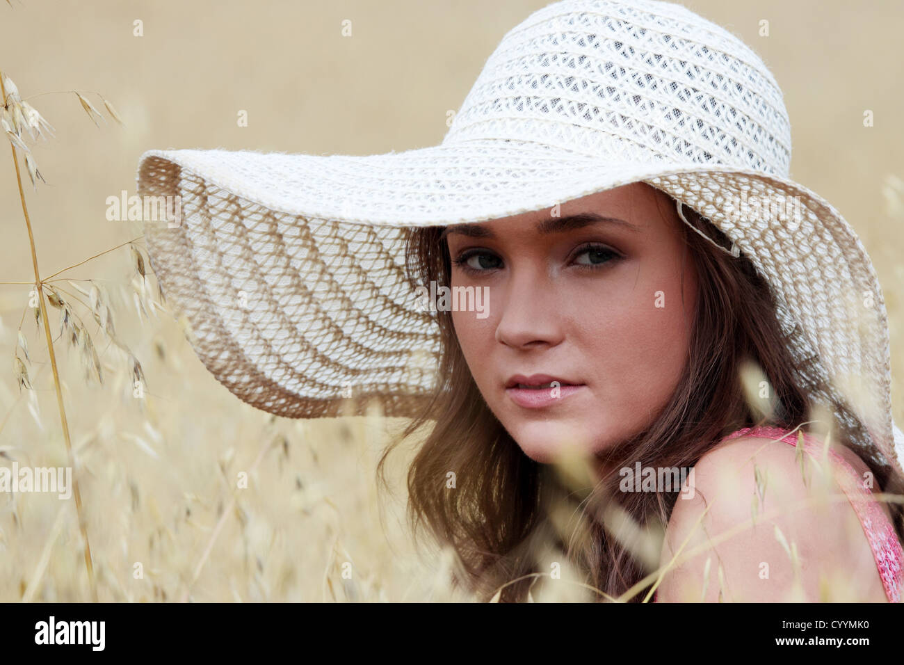 A portrait of a beautiful woman on farmland Stock Photo - Alamy