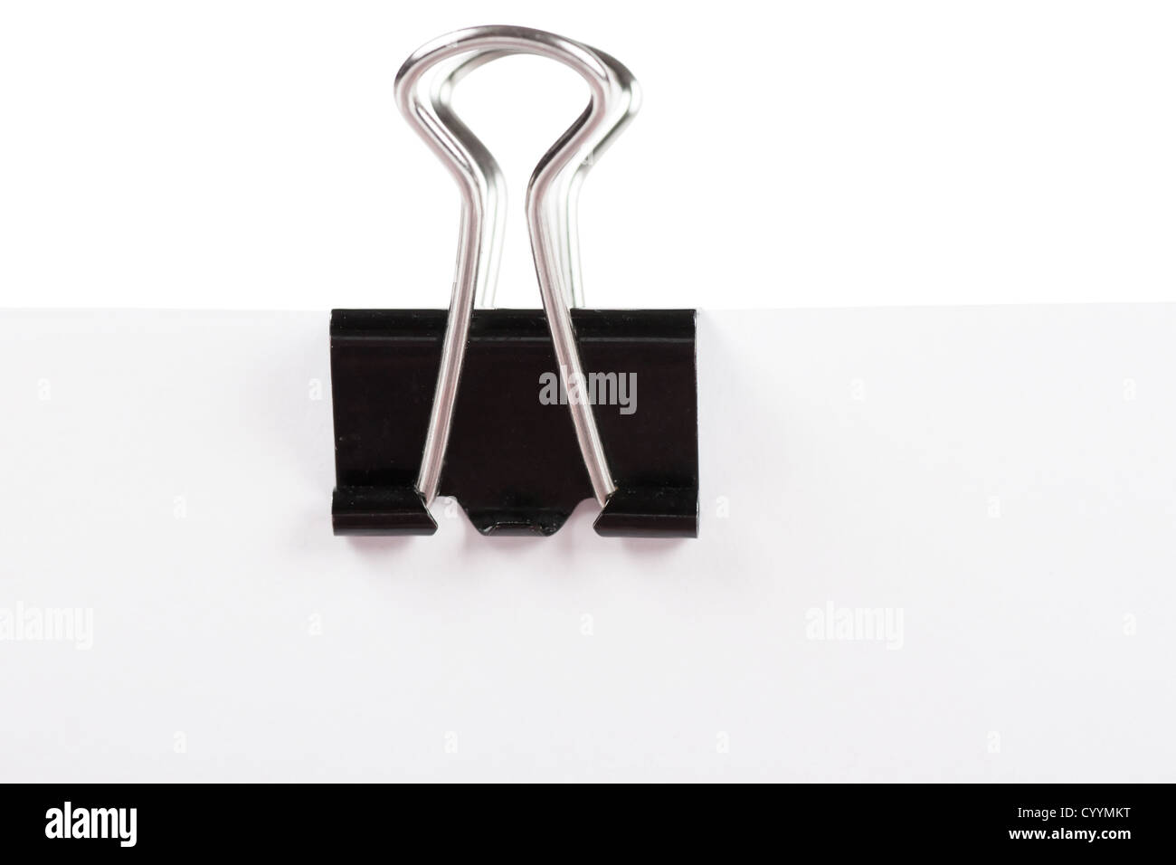 Macro view of black paper clip on a white paper Stock Photo - Alamy
